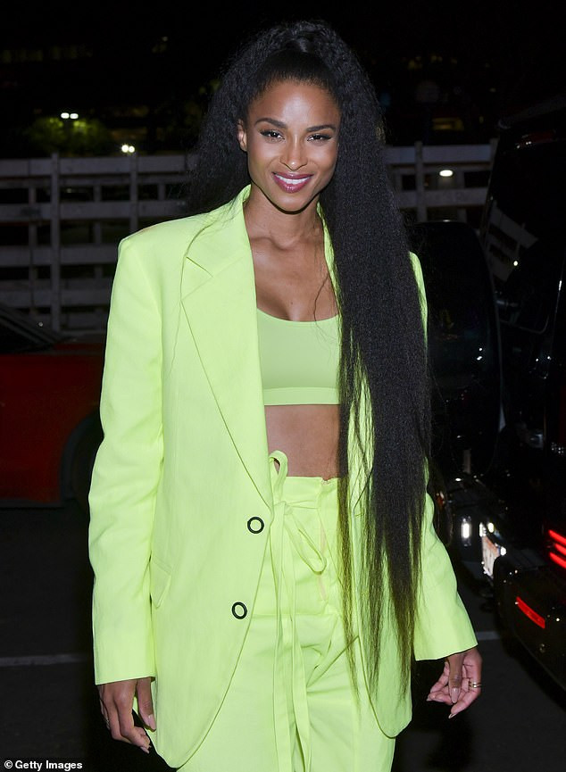 Ciara flaunts her in abs in neon ensemble as she hits the stage at Ru ...