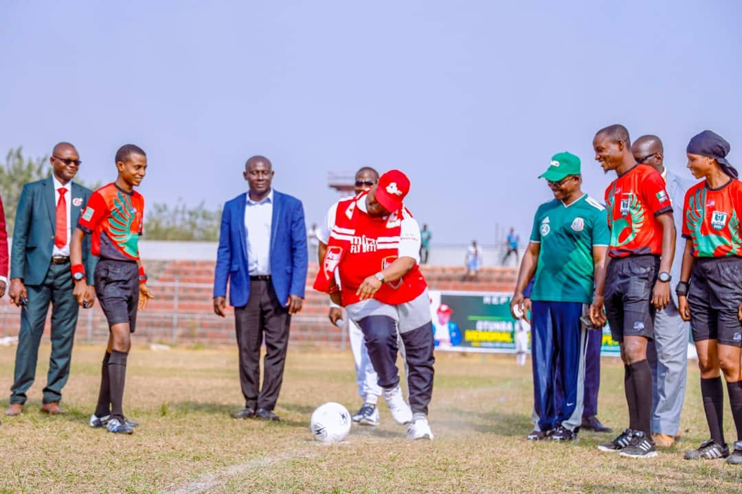 Governor Ademola Adeleke shows off his 'dribbling skills' on a football ...