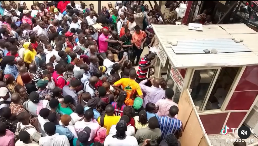 Huge crowd spotted at a Nigeria Immigration Service office in Ikeja for ...