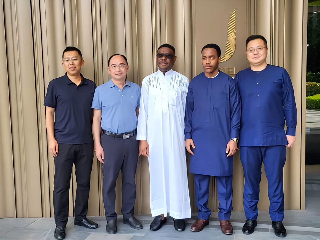 Photos of FCT Minister, Nyesom Wike and his son in China