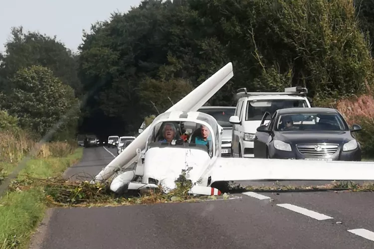 Pilot and passenger survive after plane crashed on busy road in England